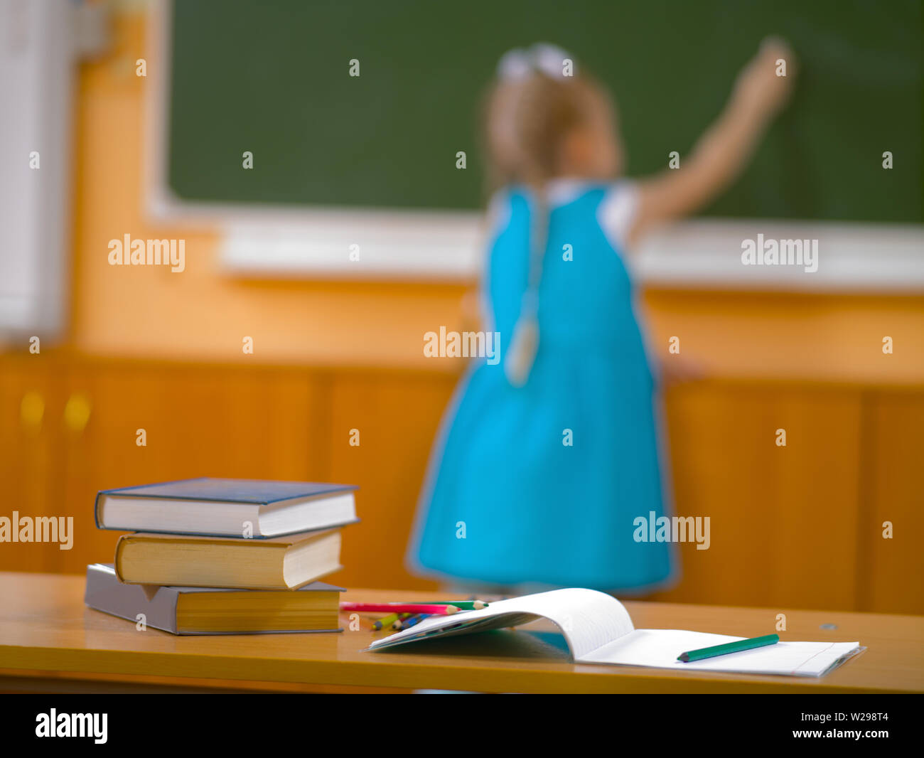 School textbooks child hi-res stock photography and images - Alamy