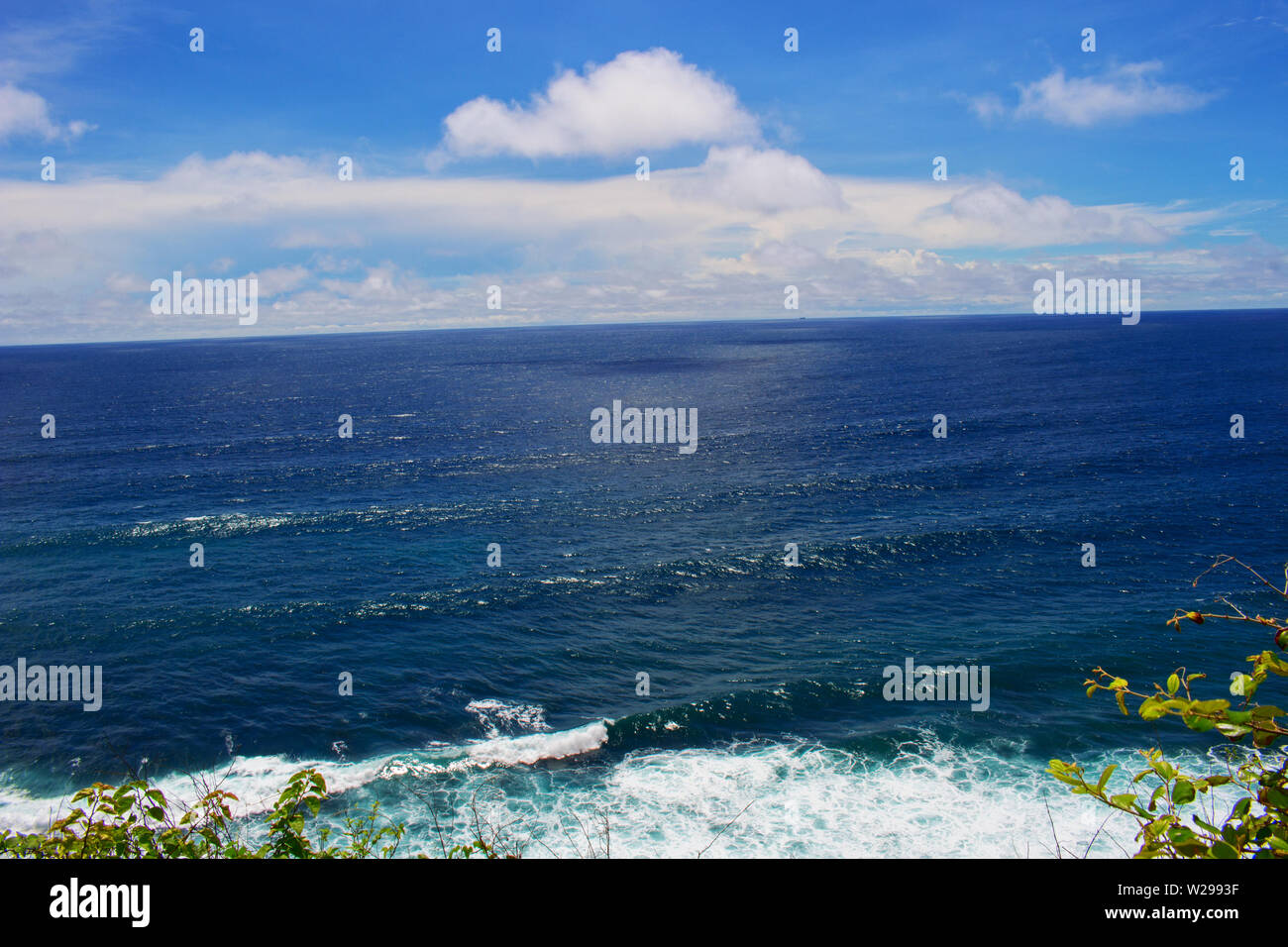 White Wave Crush in Deep Blue Seaside Stock Photo - Alamy