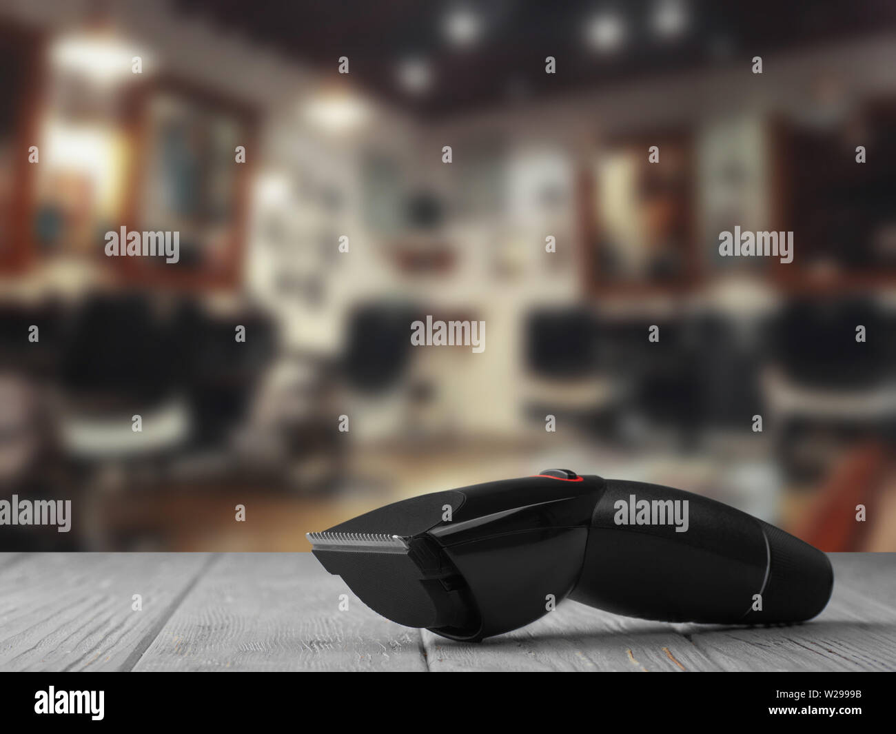 Hair clipper on the barber's table close up Stock Photo - Alamy