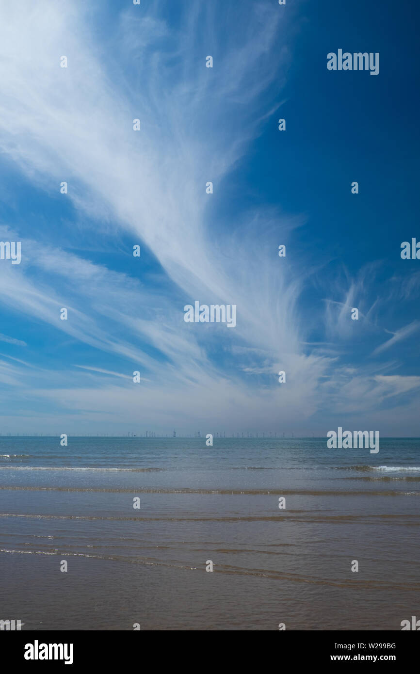 Wispy sky and the ocean hi-res stock photography and images - Alamy
