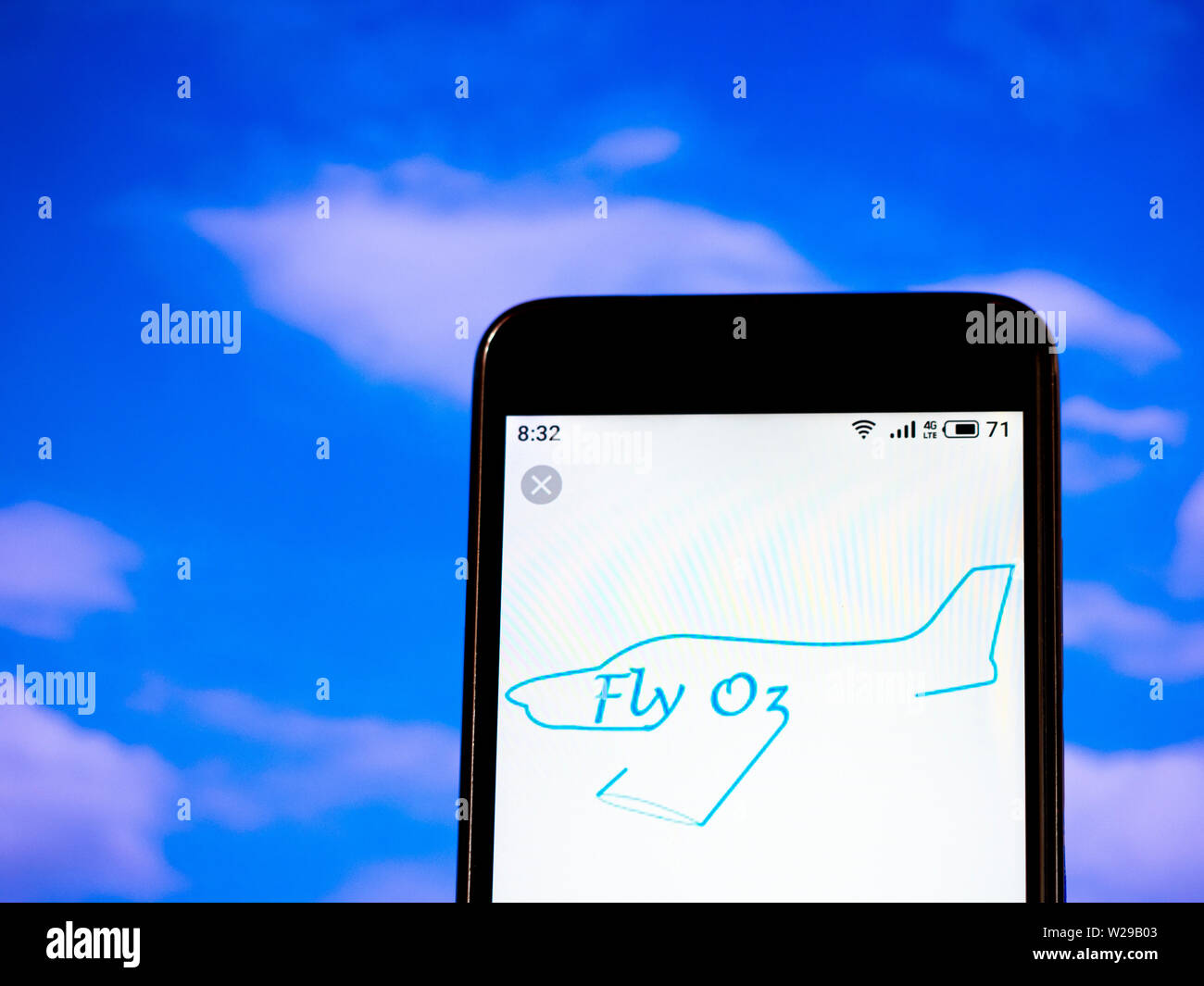 In this photo illustration the Fly Oz logo is seen displayed on a ...