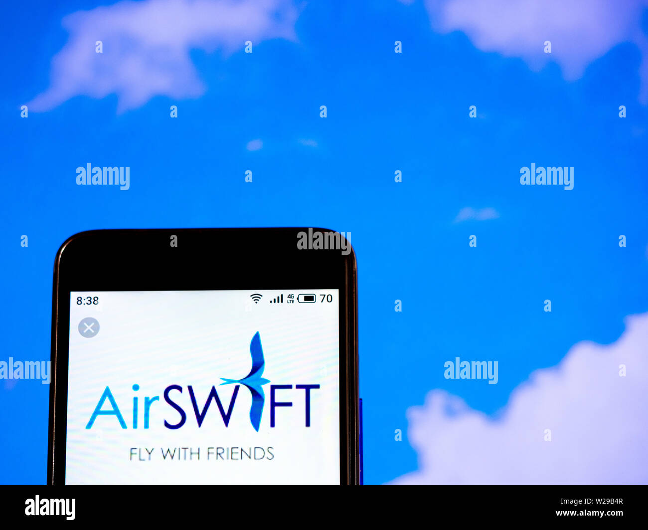 In this photo illustration the AirSWIFT logo is seen displayed on a ...