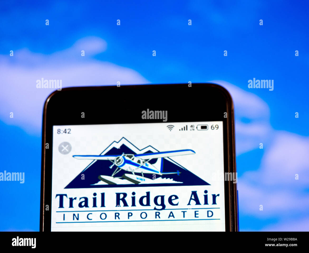 In this photo illustration the Trail Ridge Air logo is seen displayed ...
