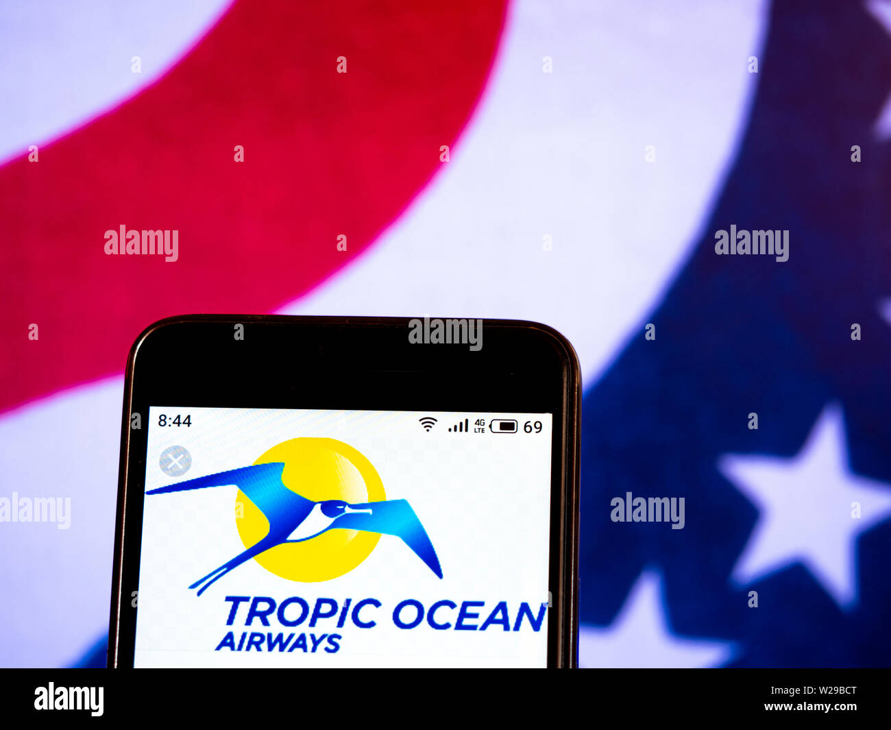 In this photo illustration the Tropic Ocean Airways logo is seen ...