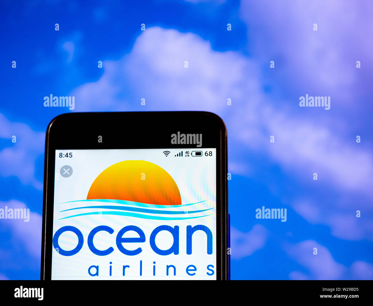 In this photo illustration the Ocean Airlines logo is seen displayed on ...