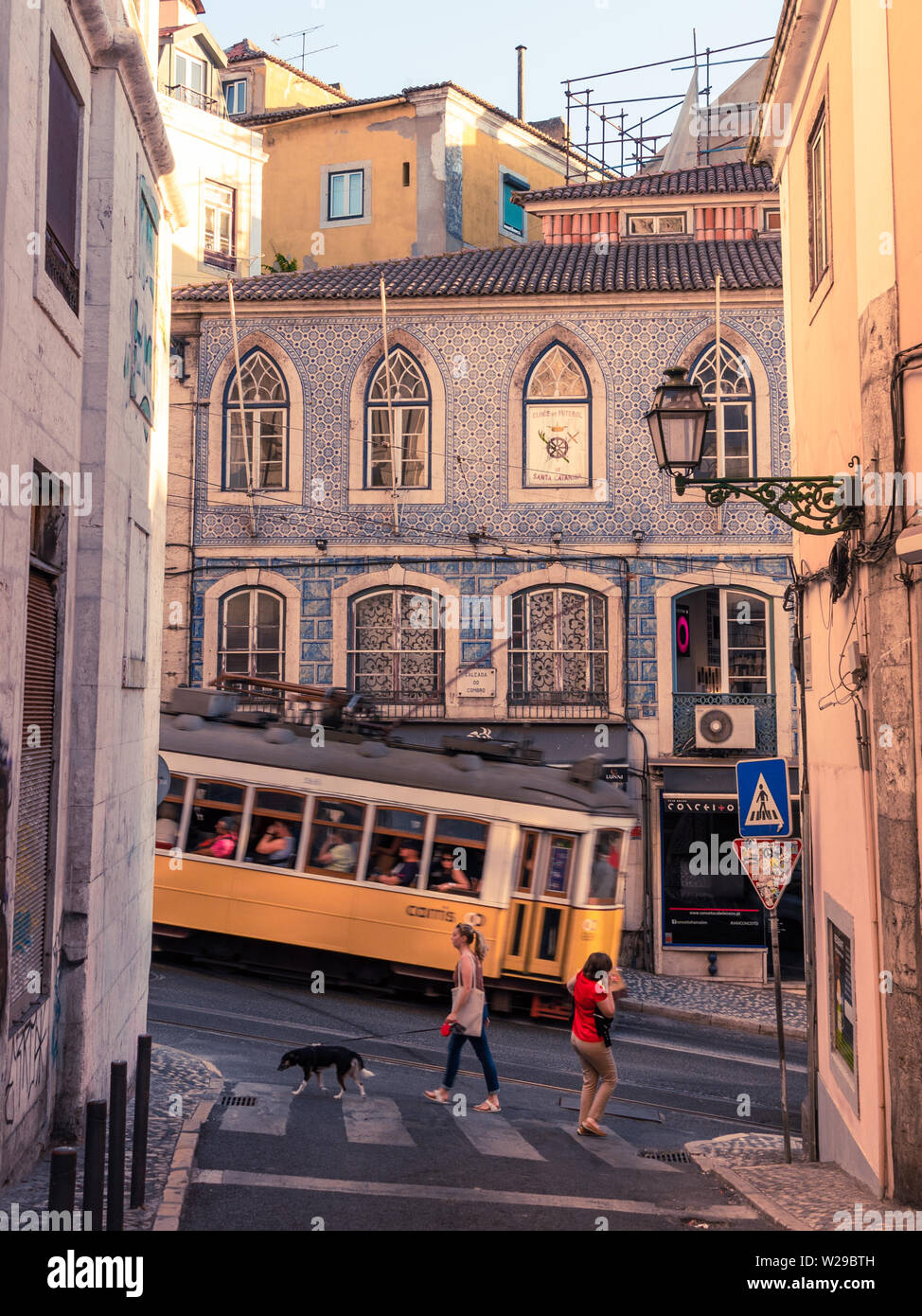 Lisbon, Portugal, 03/10-18. A tram in the street Calçada do combro, two ...
