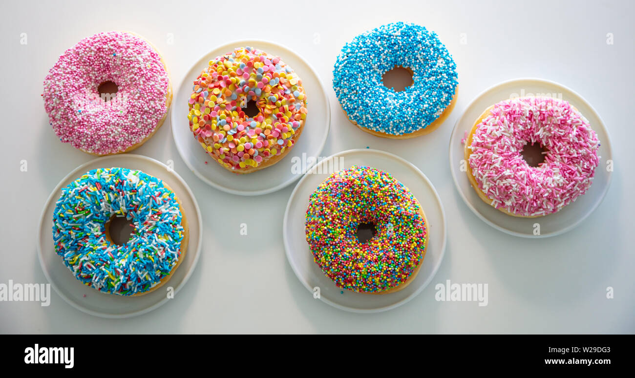 Assorted donuts. Colorful donuts assortment on white color background ...
