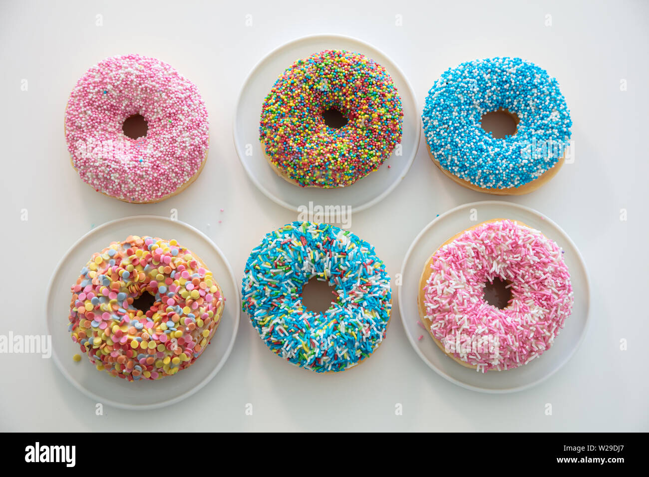Assorted donuts. Colorful donuts assortment on white color background ...
