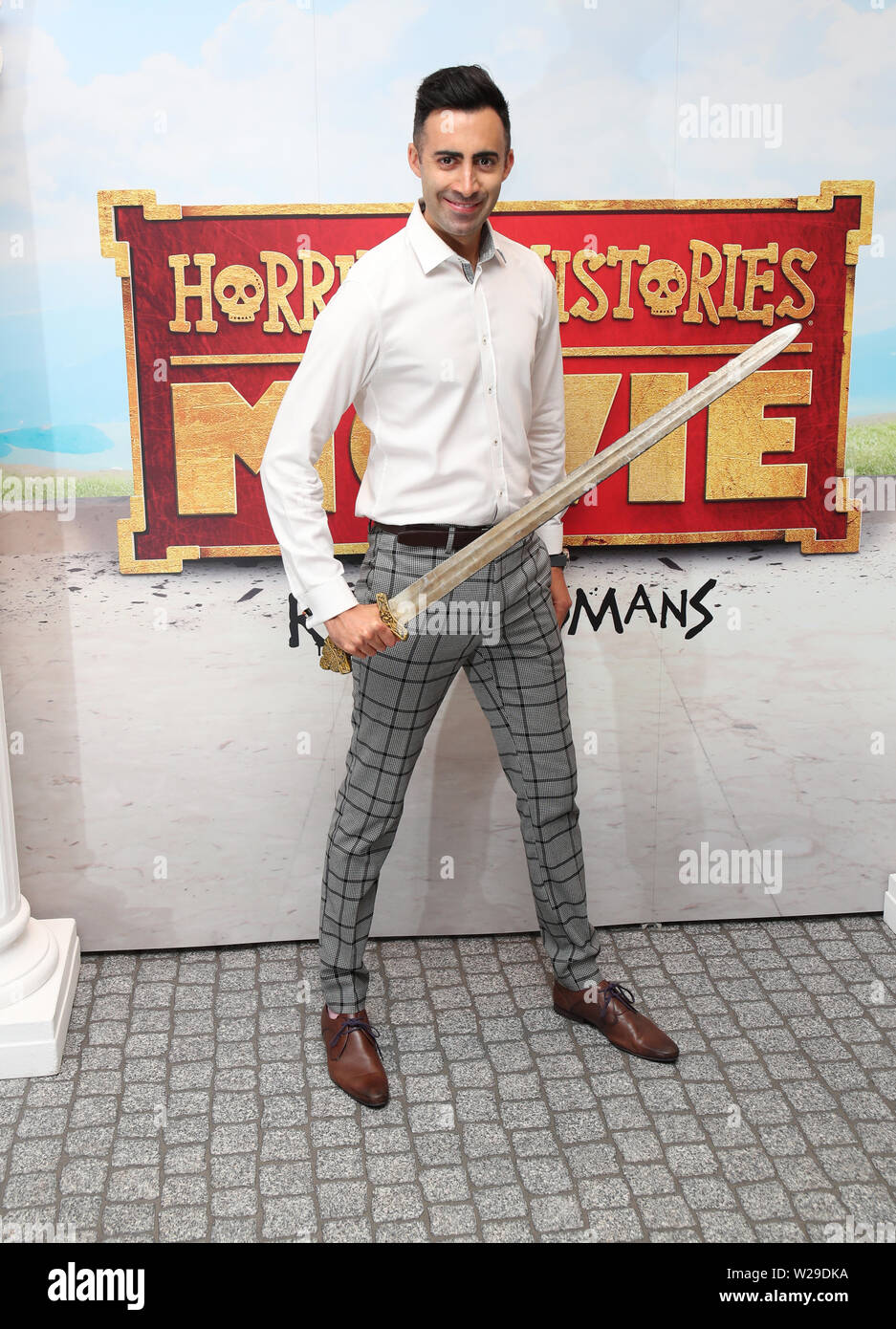 Richard David-Caine attending the premiere of Horrible Histories The ...