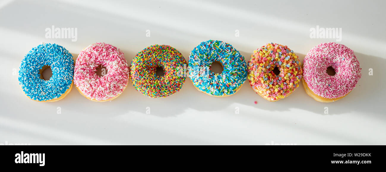 Assorted donuts. Colorful donuts assortment on white color background ...