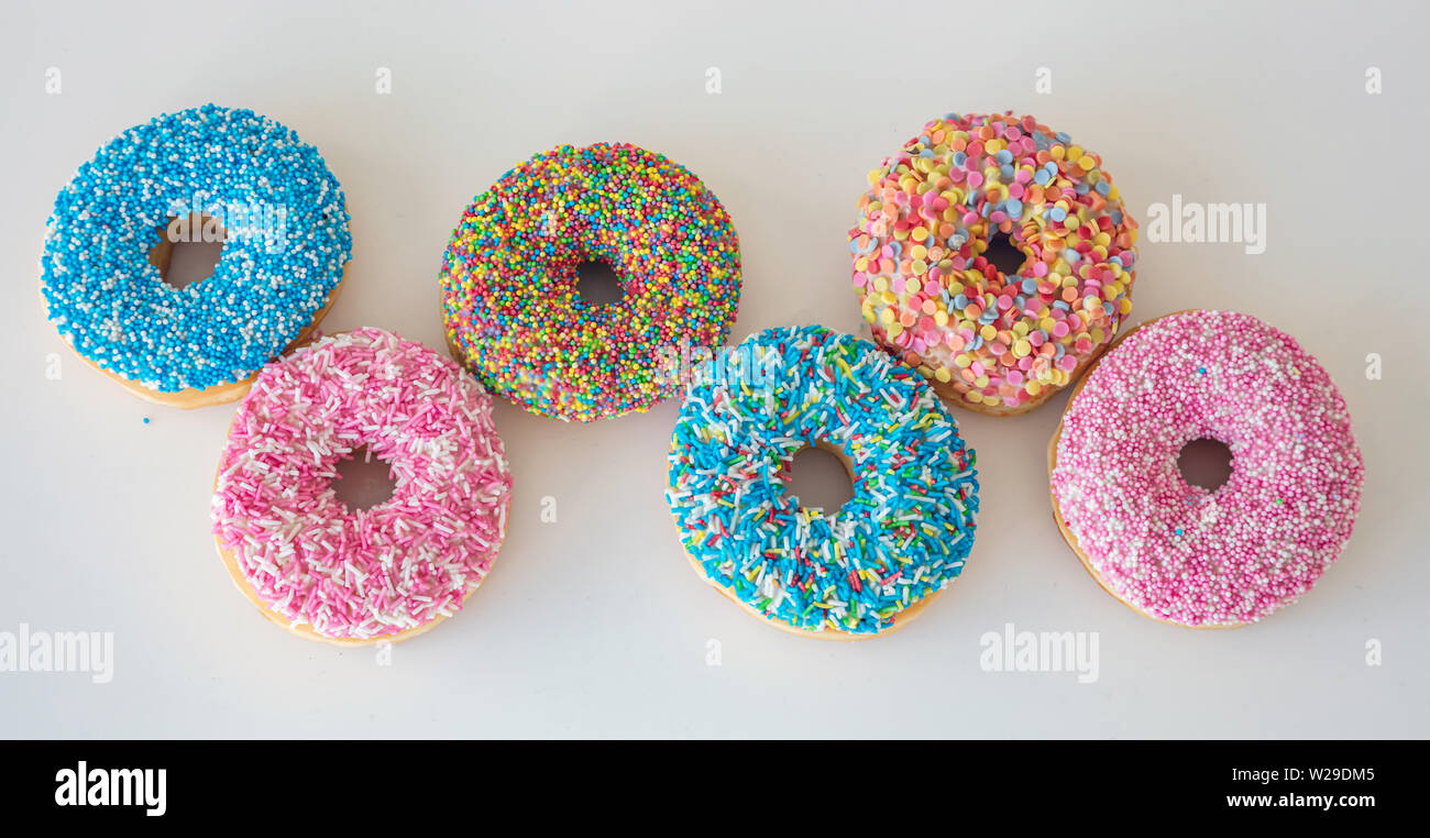 Assorted donuts. Colorful donuts assortment on white color background ...