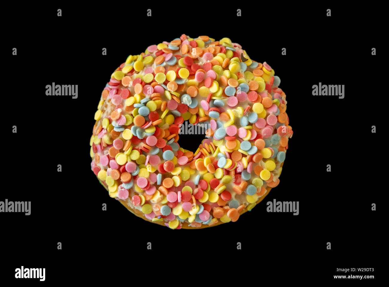 Multicolor donut. One donut with colorful pastel chips decoration ...