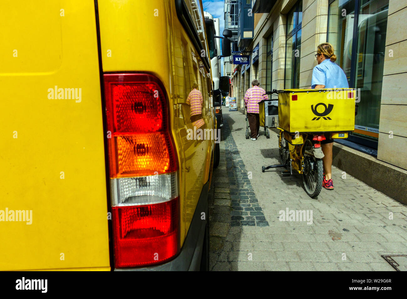 Deutsche Post, postman distributes mail, bicycle delivery, Dresden ...