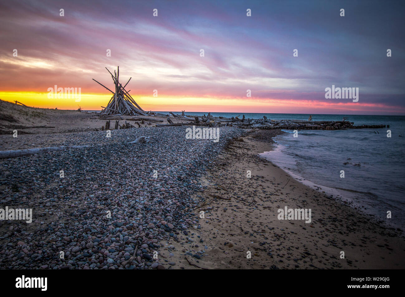 Sunset on remote beach hi-res stock photography and images - Alamy