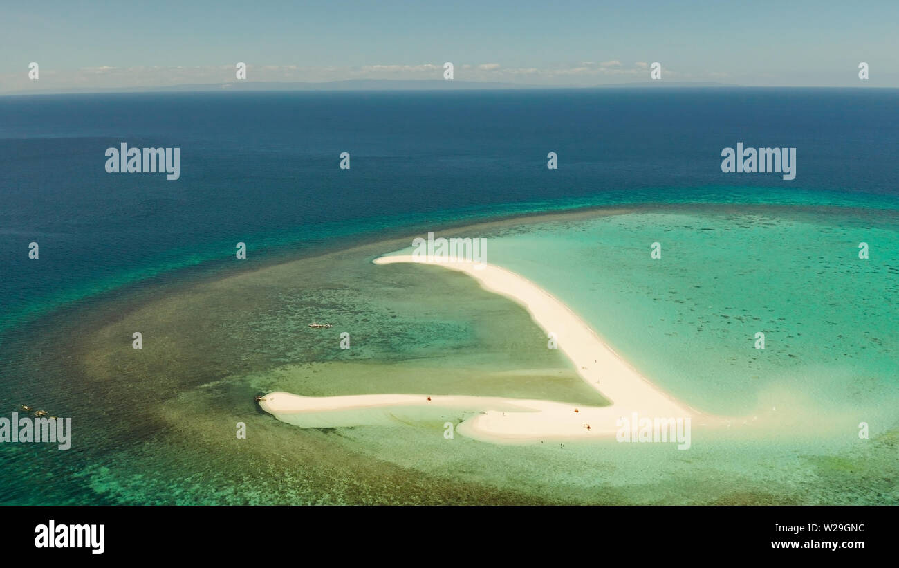 Beautiful beach on tropical island surrounded by coral reef, sandy bar ...