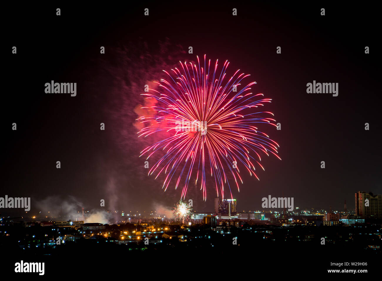 Colorful fireworks explosion in the dark sky Stock Photo - Alamy