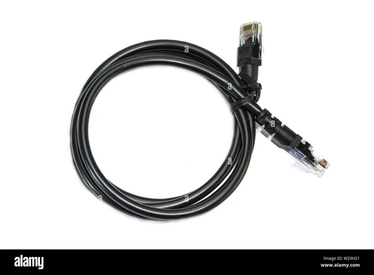top view black RJ45 computer network connecting cable on white ...