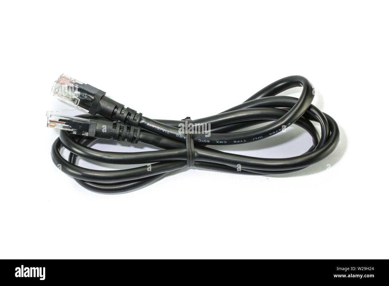Black RJ45 computer network connecting cable on white background Stock ...