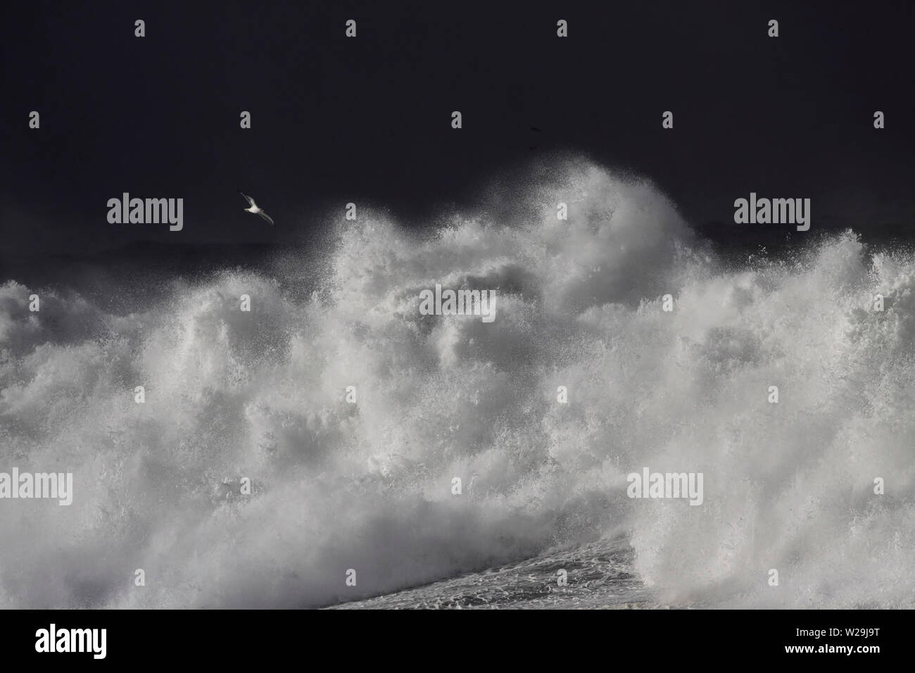 Big waves crash against rocky hi-res stock photography and images - Alamy