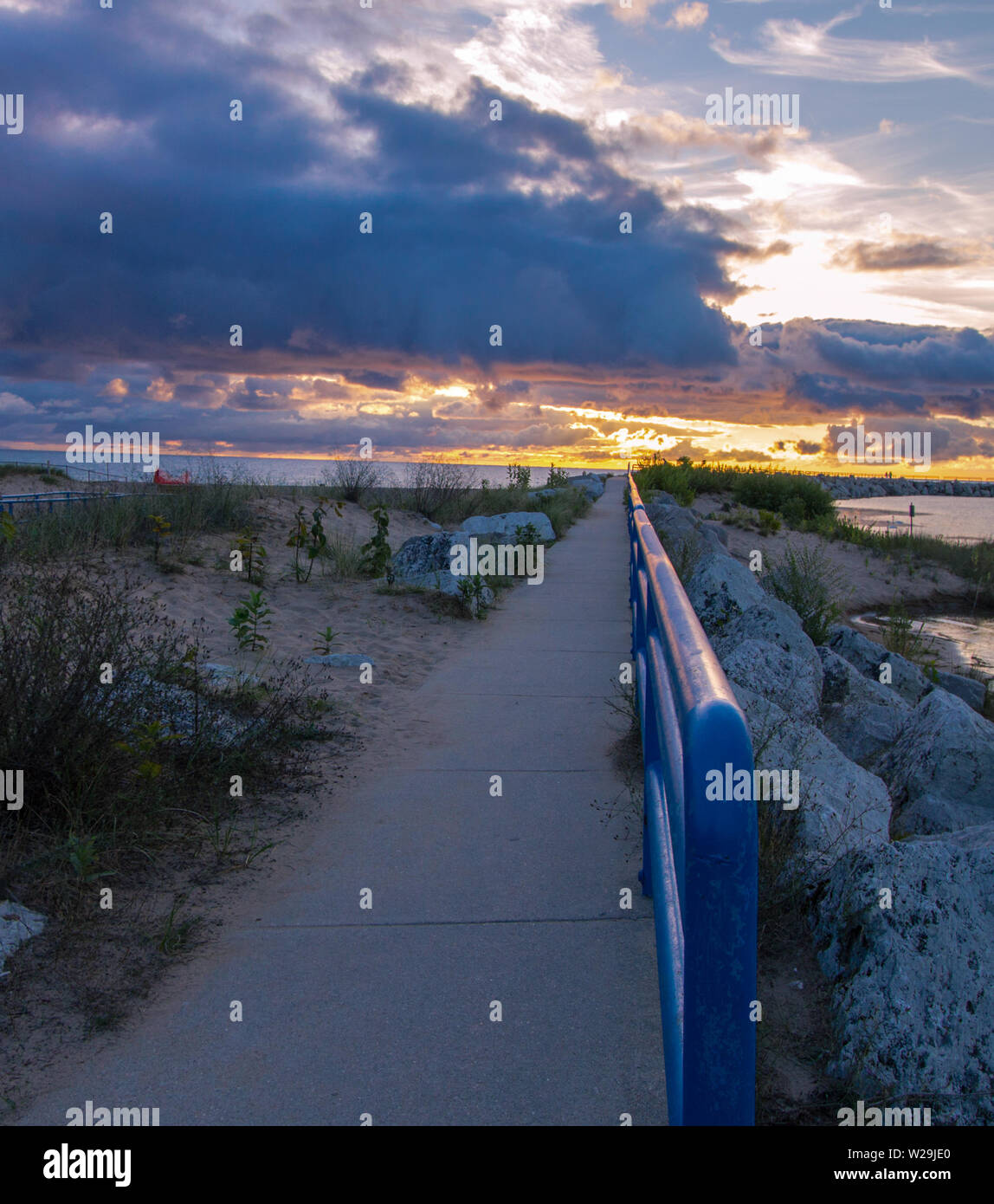 Small coastal town long pier hi-res stock photography and images - Alamy