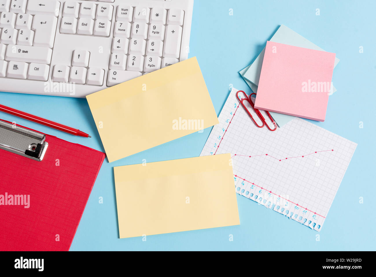 Paper blue desk computer keyboard office study notebook chart numbers ...