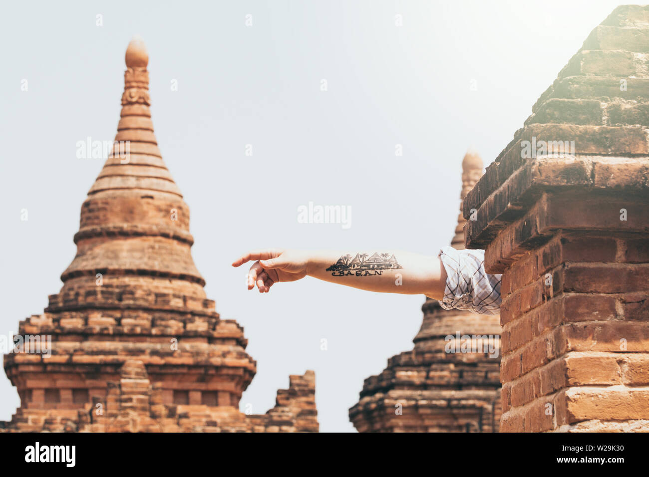 Bagan, Myanmar - March 2019: hand with tattoo showing temples and ...