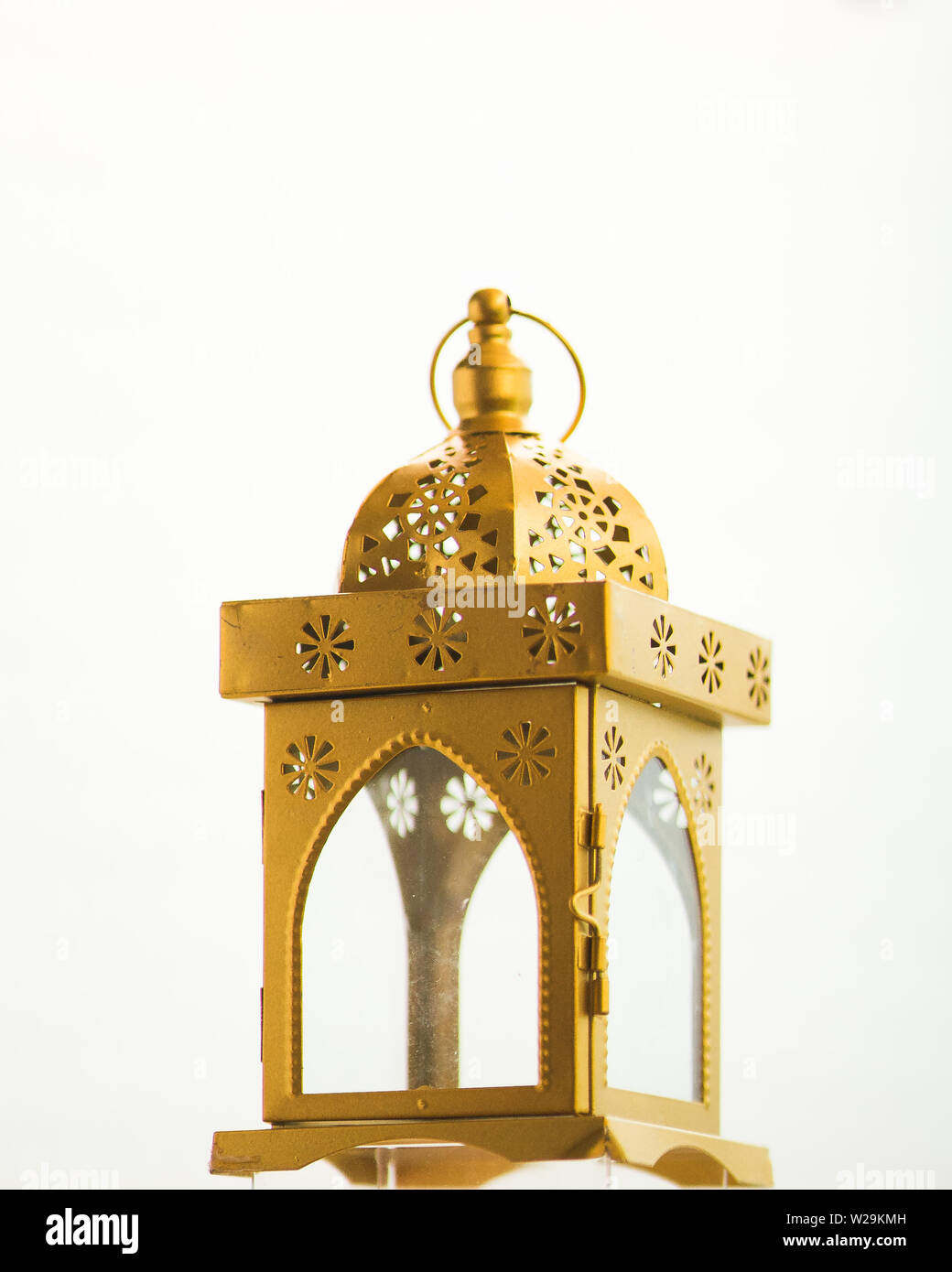 Traditional fanoos or an Arabic decorative lantern on white background ...