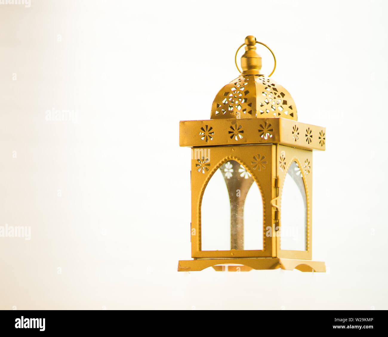 Traditional fanoos or an Arabic decorative lantern on white background ...