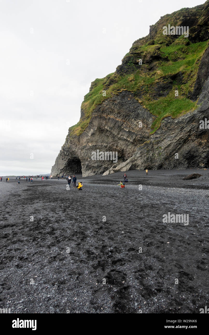 View along Reynisfjara black sand beach towards hexagonal basalt ... View along Reynisfjara black sand beach towards hexagonal basalt ...