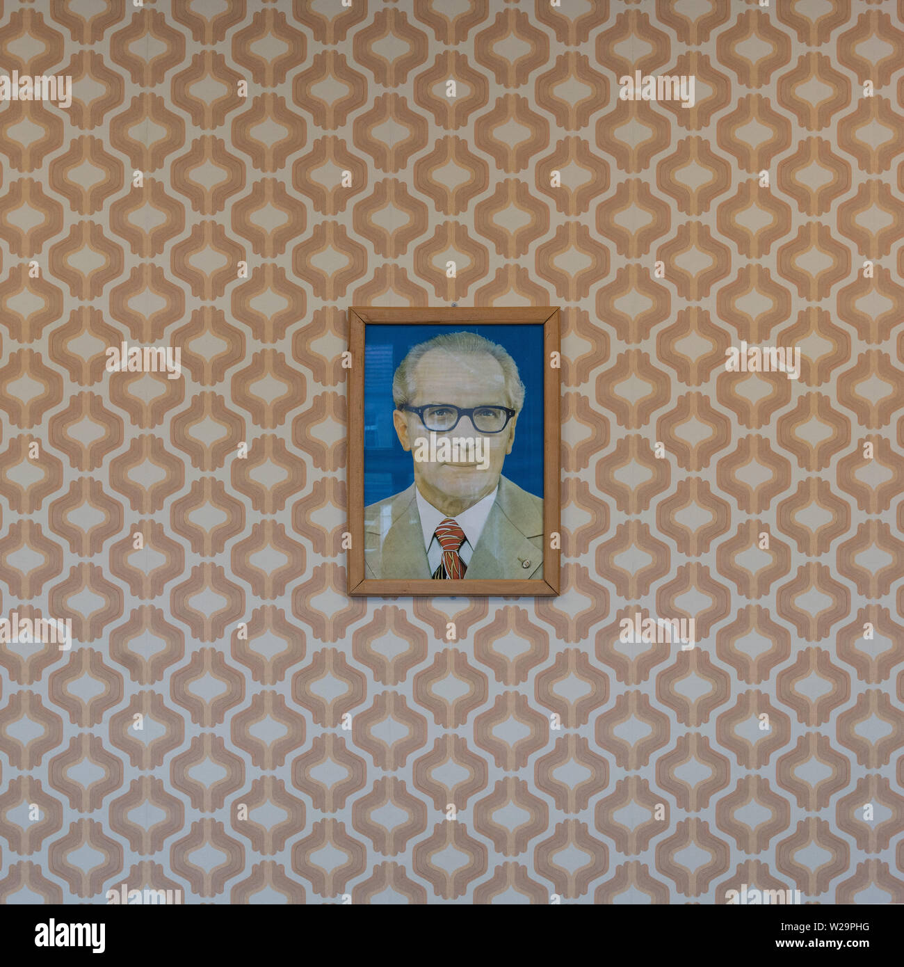 A portrait of Eric Honecker hangs in an office at Hohenschönhausen in ...