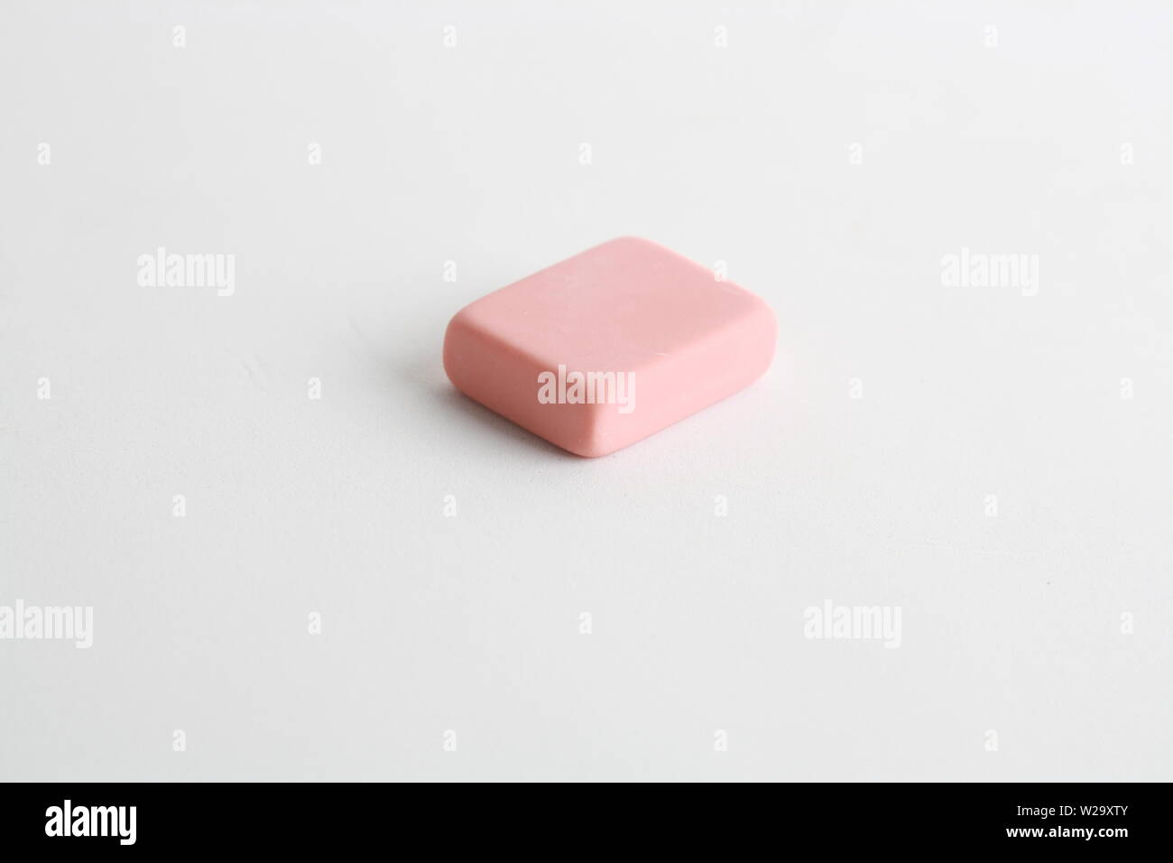 pink eraser on colorful background Stock Photo - Alamy