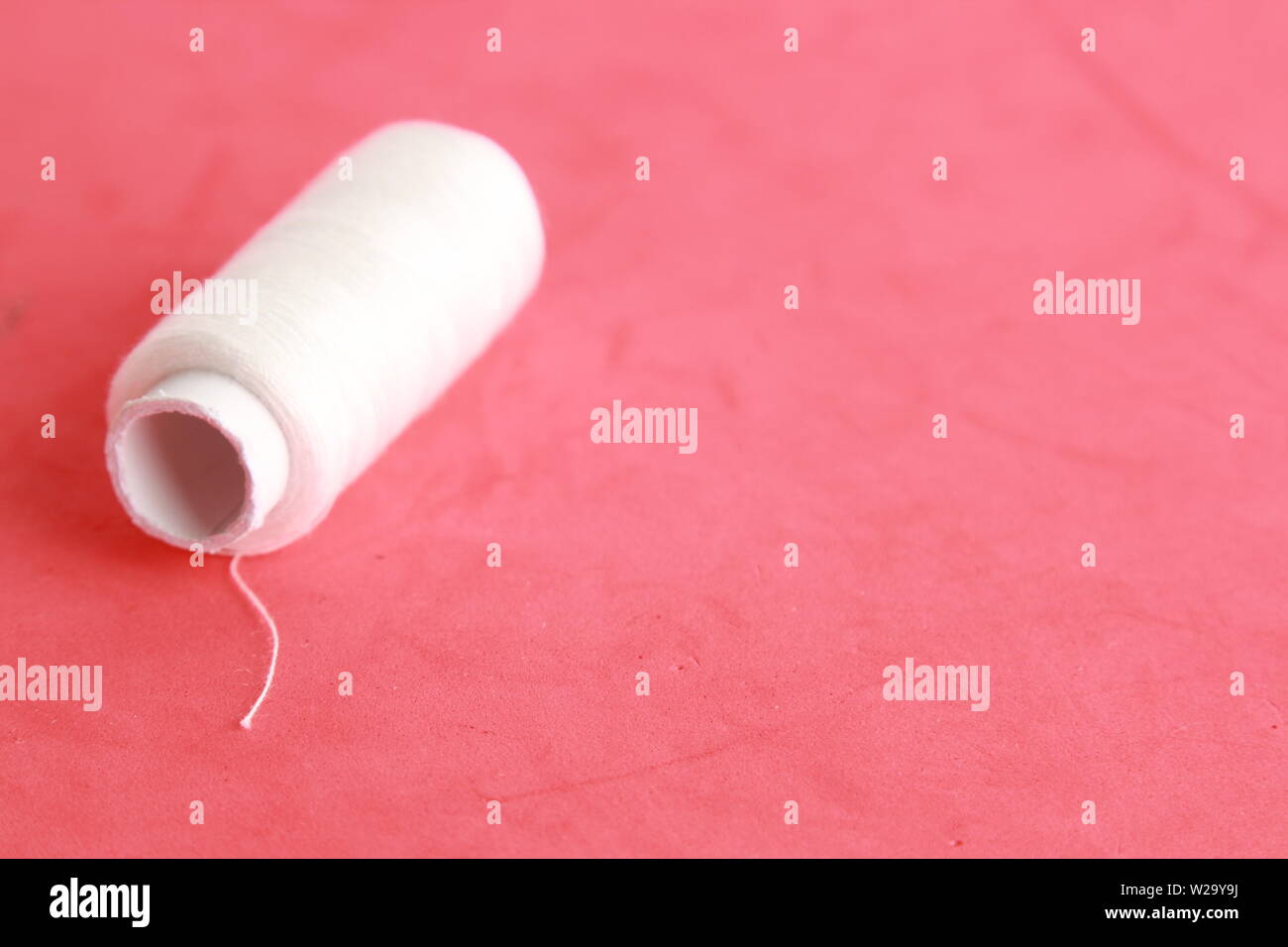 sewing thread white clothes Stock Photo - Alamy