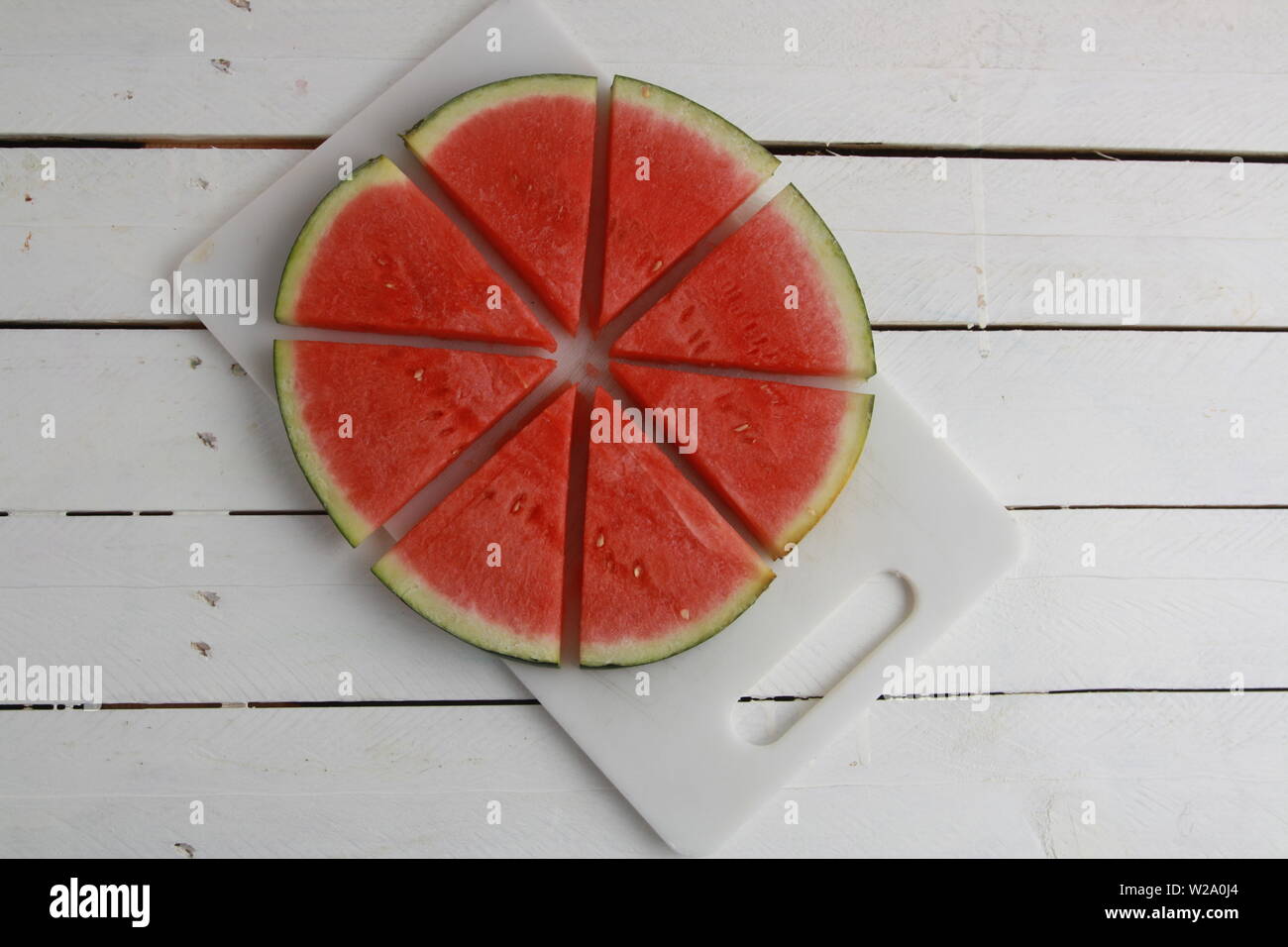 delicious watermelon cut into triangles Stock Photo - Alamy