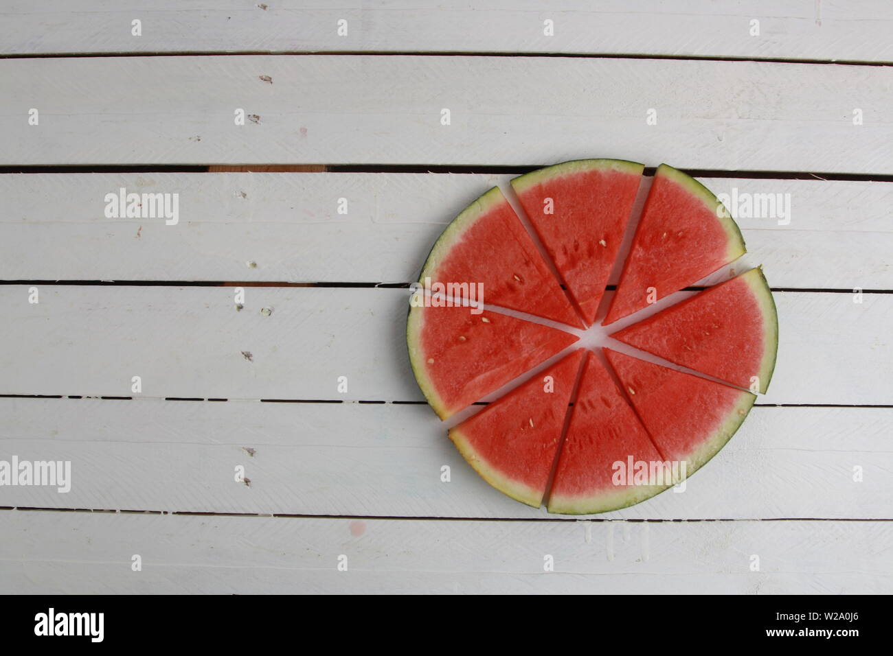 delicious watermelon cut into triangles Stock Photo - Alamy
