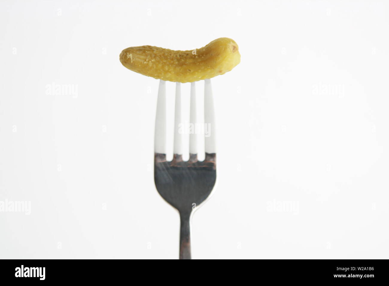 delicious gherkin on white background Stock Photo - Alamy