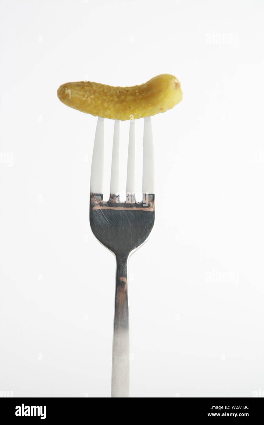 delicious gherkin on white background Stock Photo - Alamy