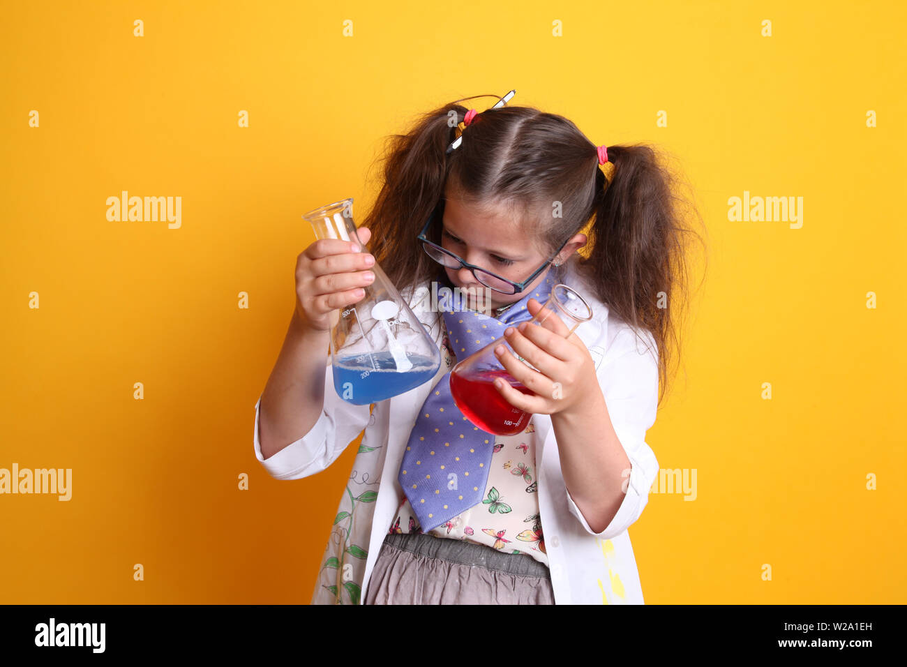 MR - Science Experiment Geek in glasses Young Girl Age 7 measuring ...