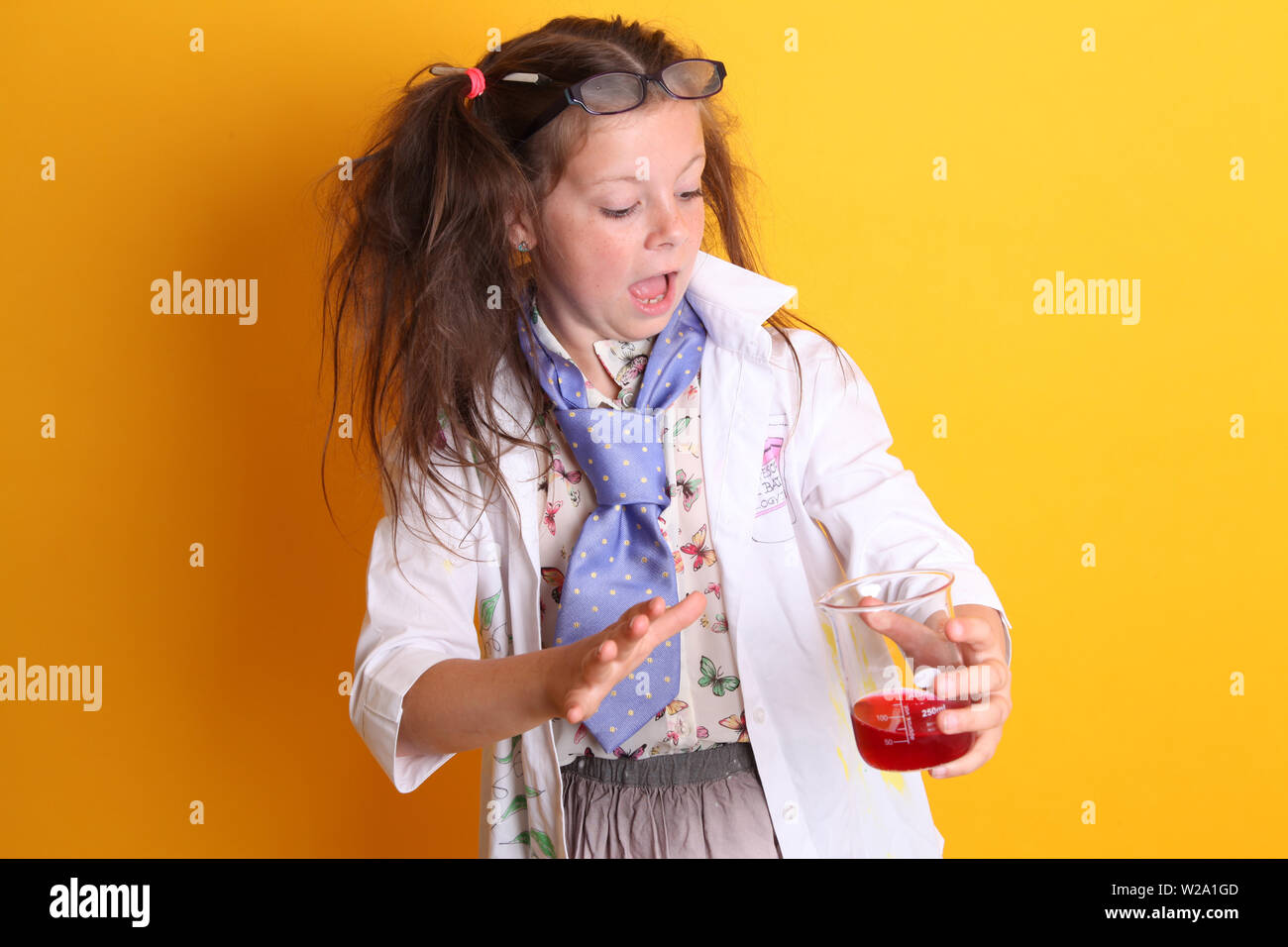 Child scientist looking at beaker High Resolution Stock Photography and ...