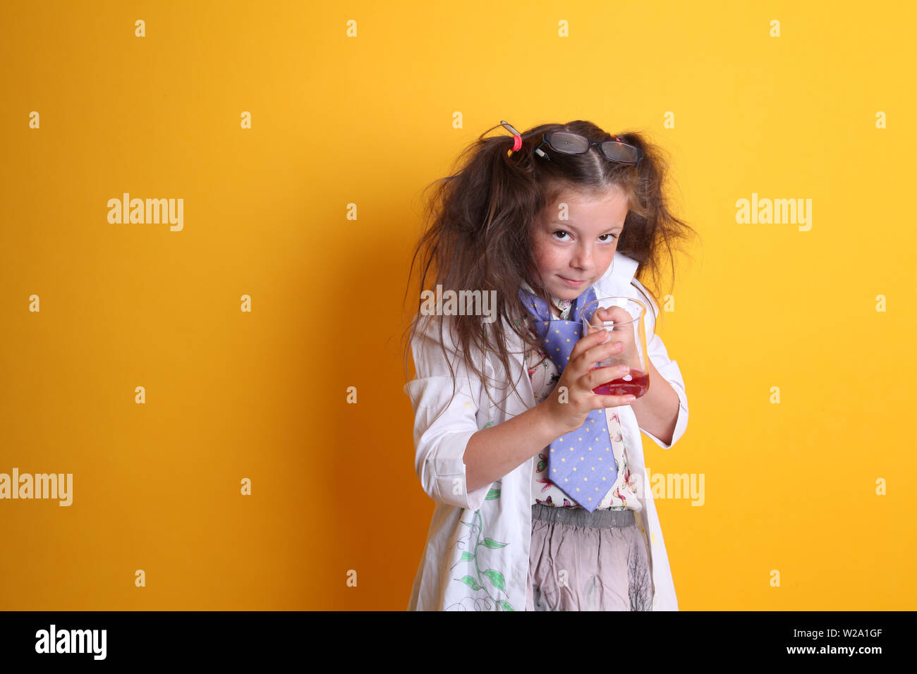 MR - Science Geek Young Girl / Female Age 7 looking at camera holding ...