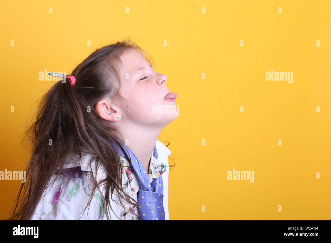 MR - Young little girl / Female Age 7 - child sticking or poking tongue ...