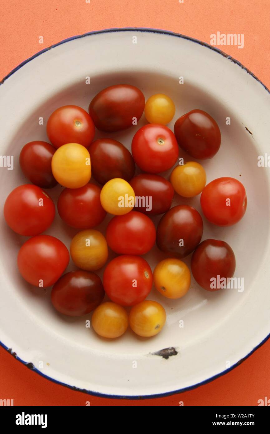 Three varieties of cherry tomatoes Stock Photo - Alamy