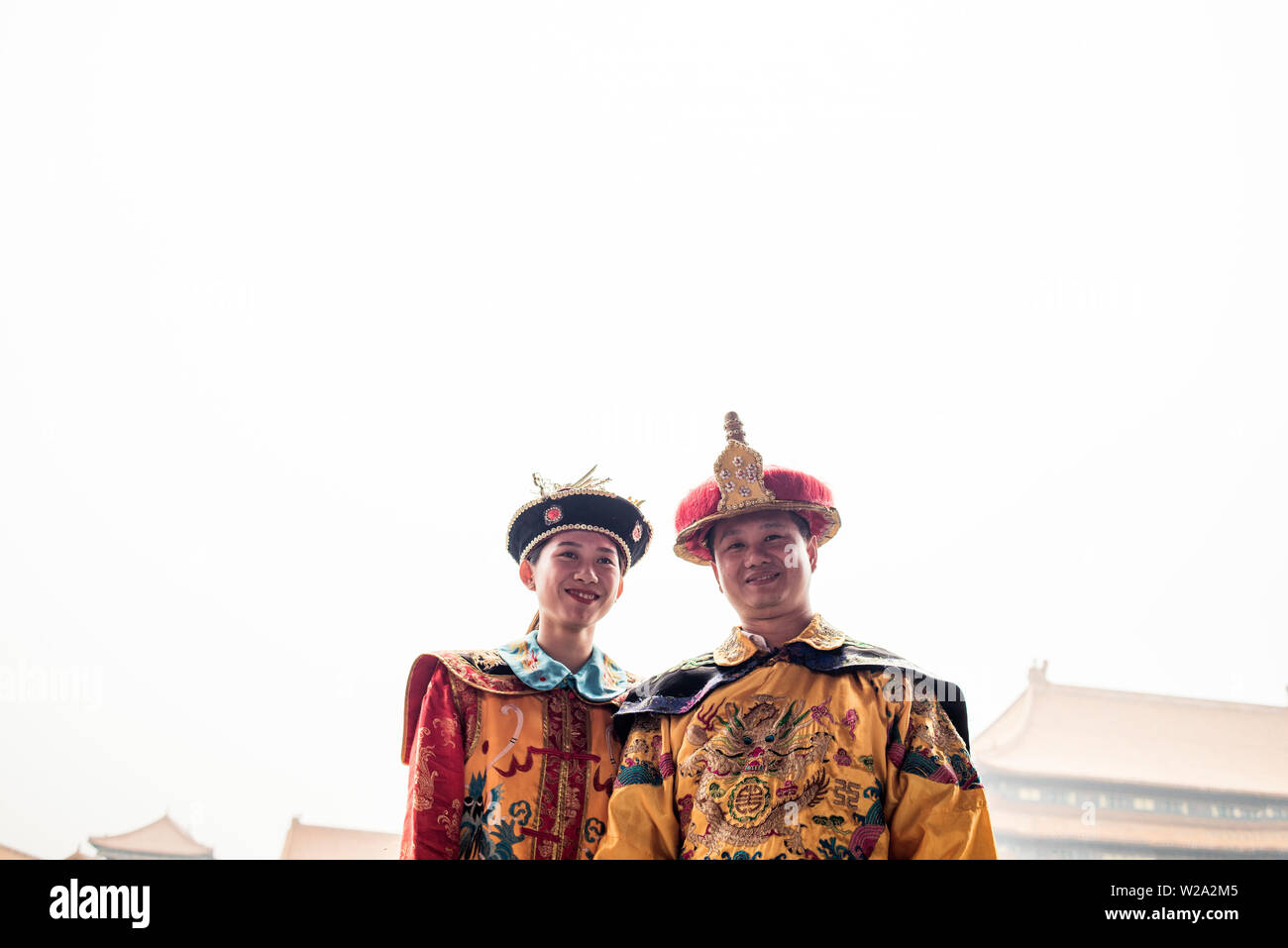 Tourists wear traditional Chinese clothes in the Forbidden City in ...