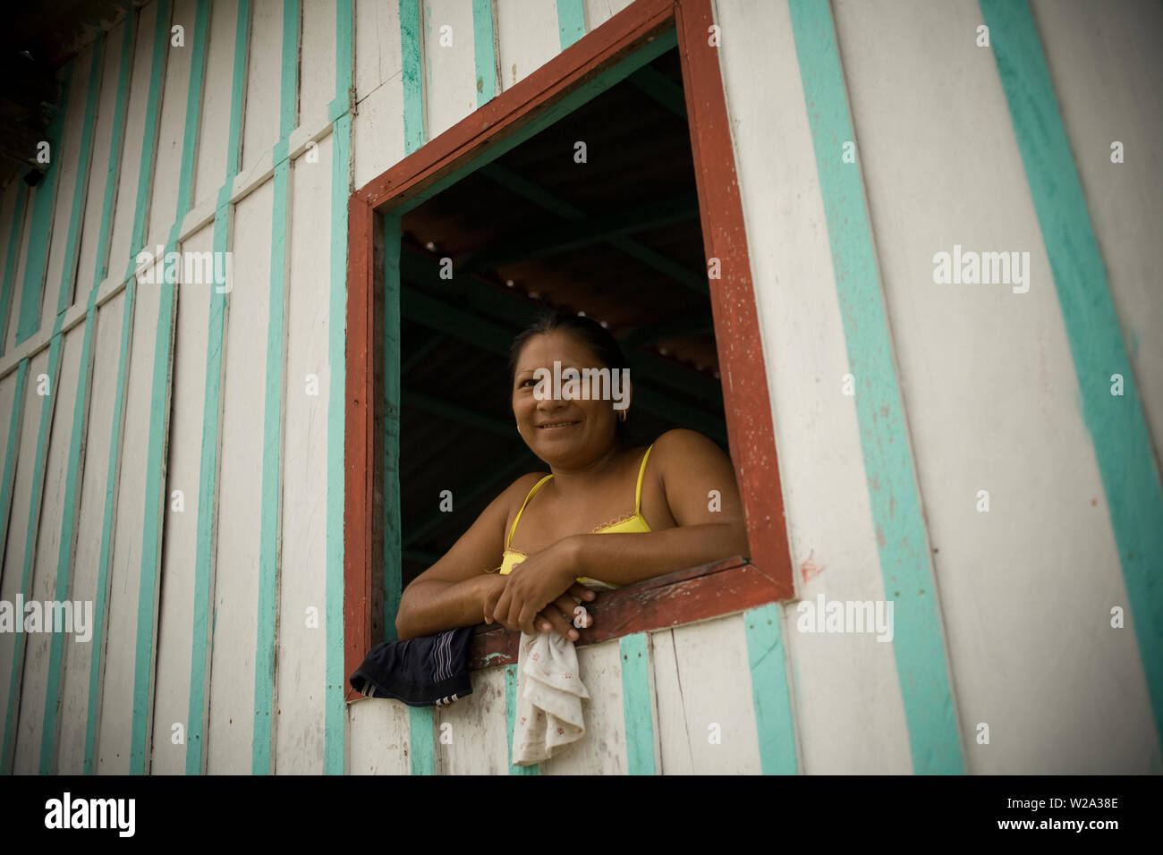 Woman in the Window, Nova Esperança Community, Cuieiras River, Amazônia ...