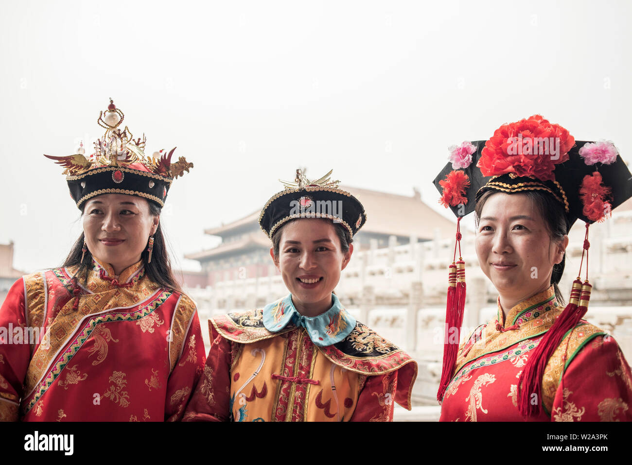 Tourists wear traditional Chinese clothes in the Forbidden City in ...
