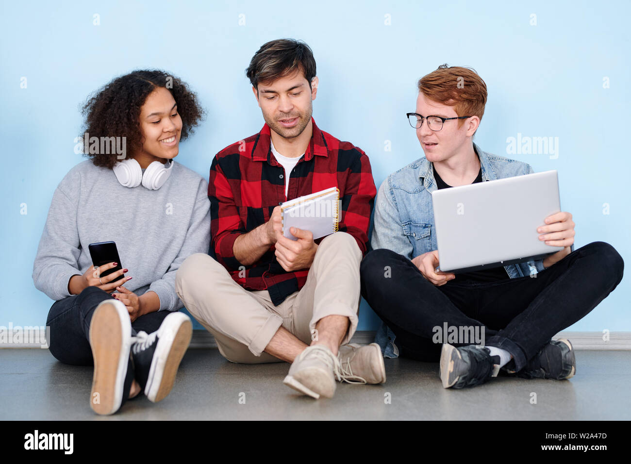Two clever students listening to explanation of their groupmate Stock ...