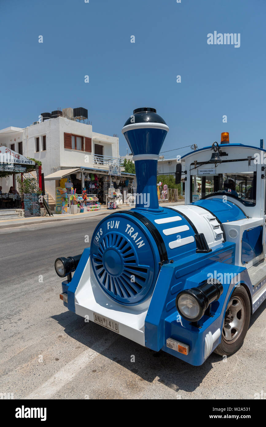 Crete, Greece. June 2019. A tourist road train on a route leaving ...