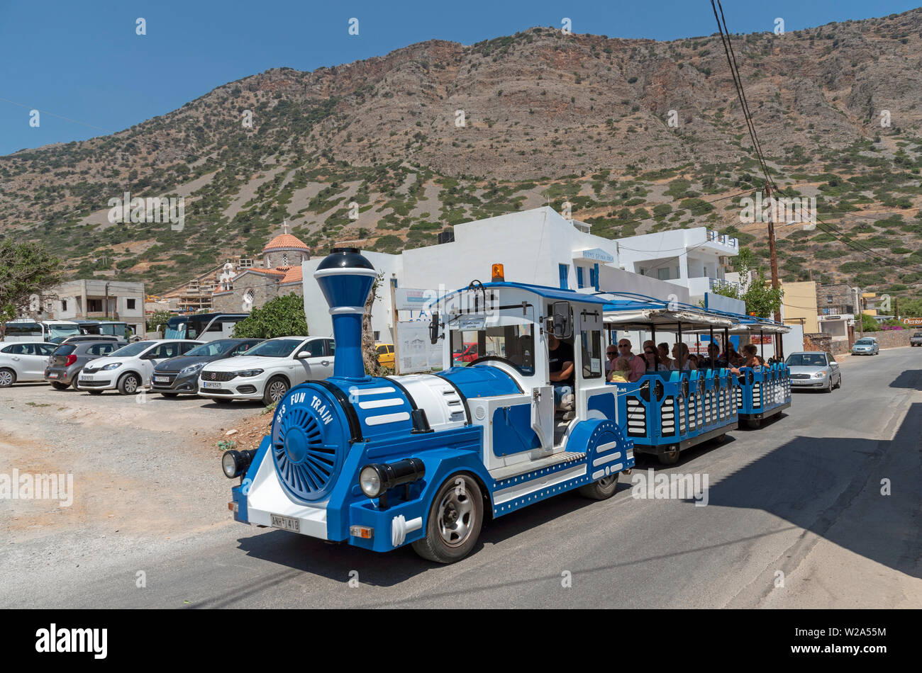 Crete, Greece. June 2019. A tourist road train on a route passing ...