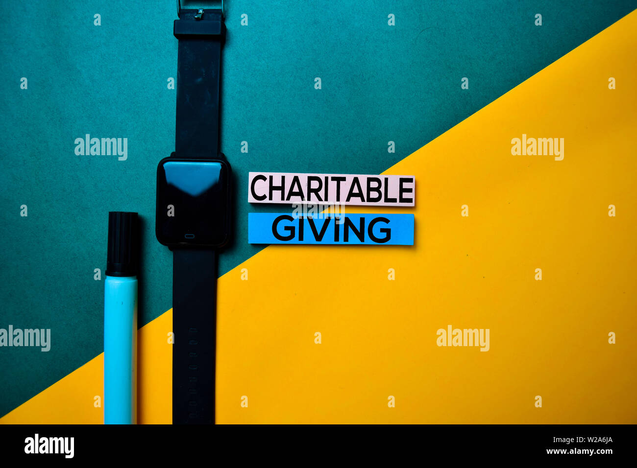 Charitable Giving text on top view color table background Stock Photo ...