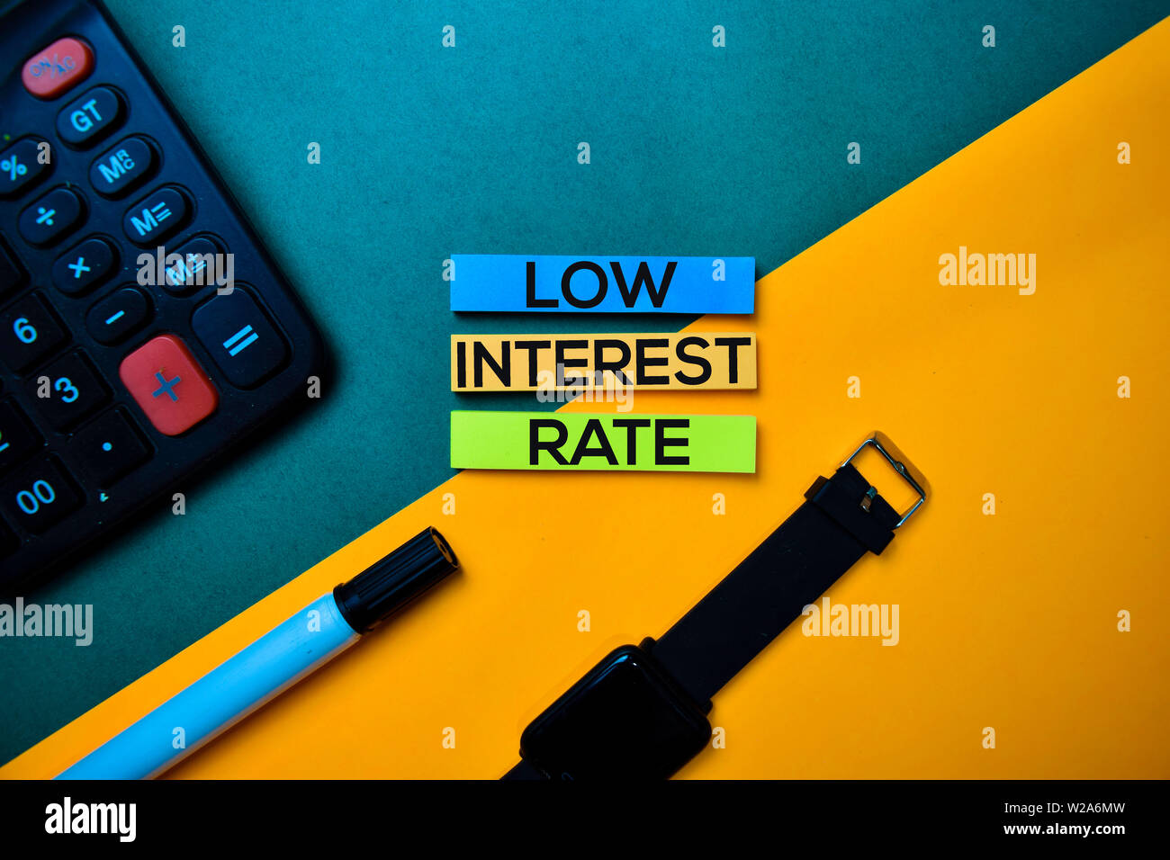 Low Interest Rate text on top view color table background Stock Photo ...