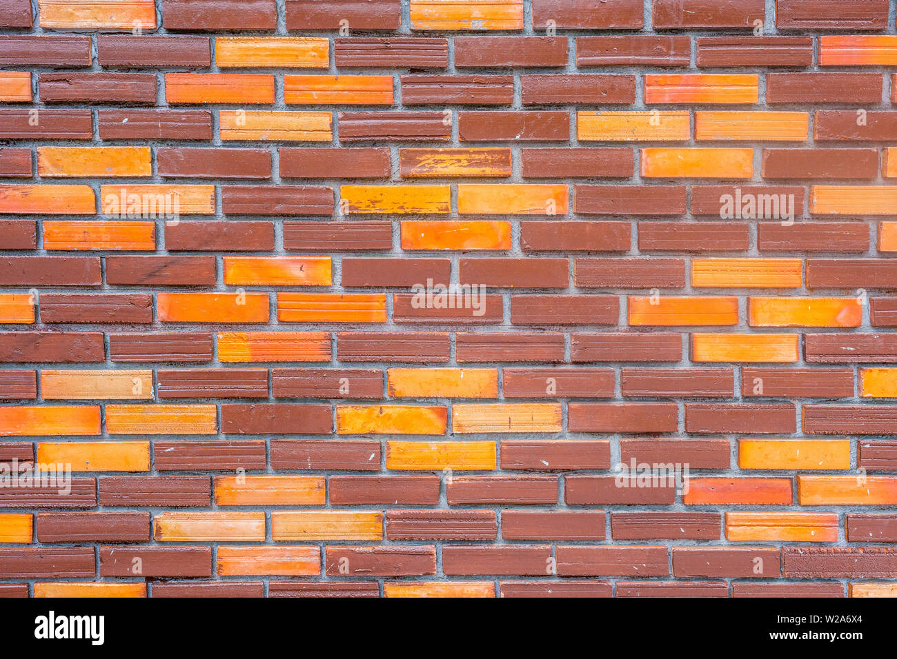 brown and orange brick pattern wall, brick wall background and texture ...
